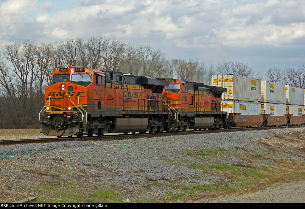 BNSF 7417 Rips a hot z train Wb.